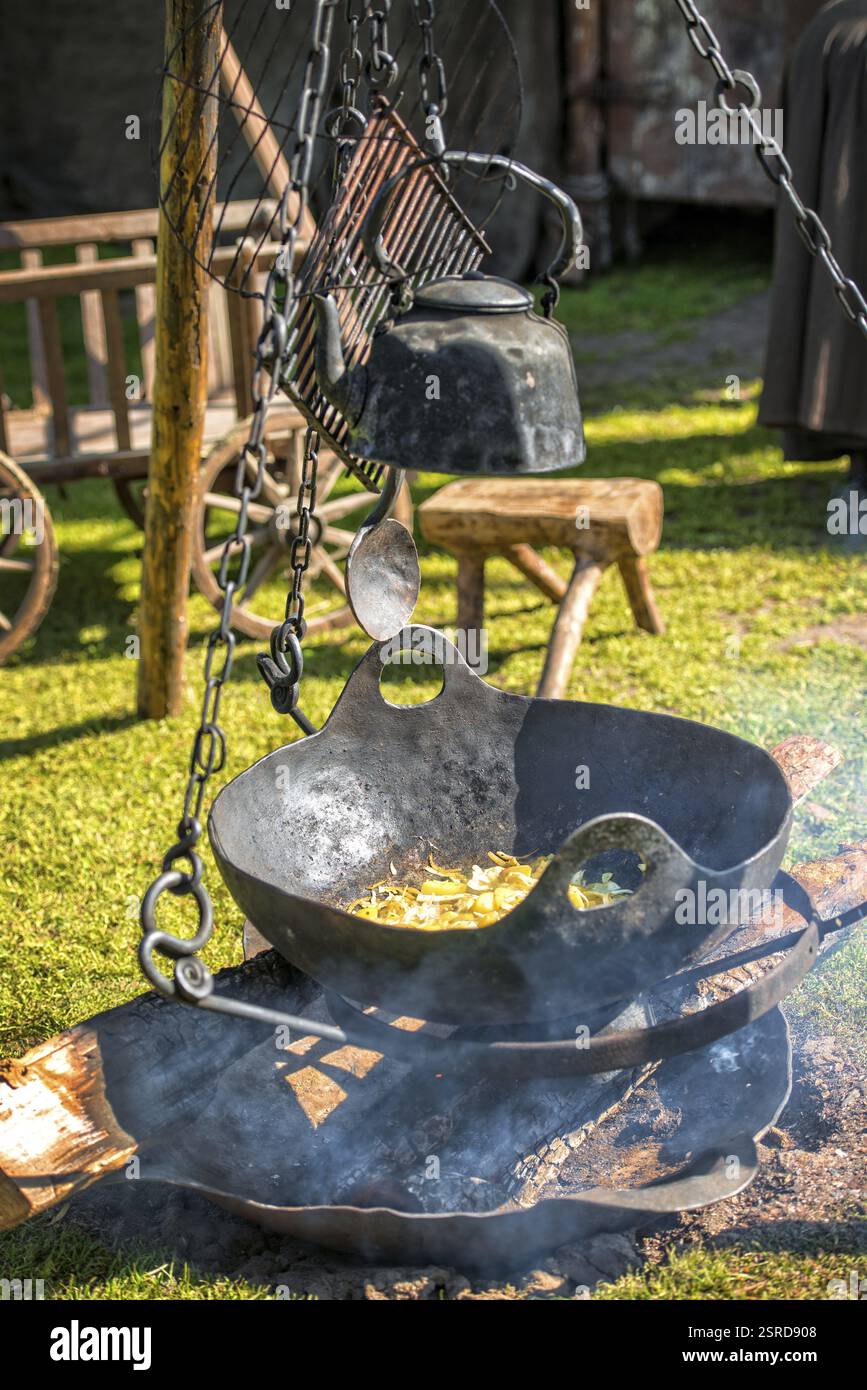 Boiling over the fire Stock Photo - Alamy