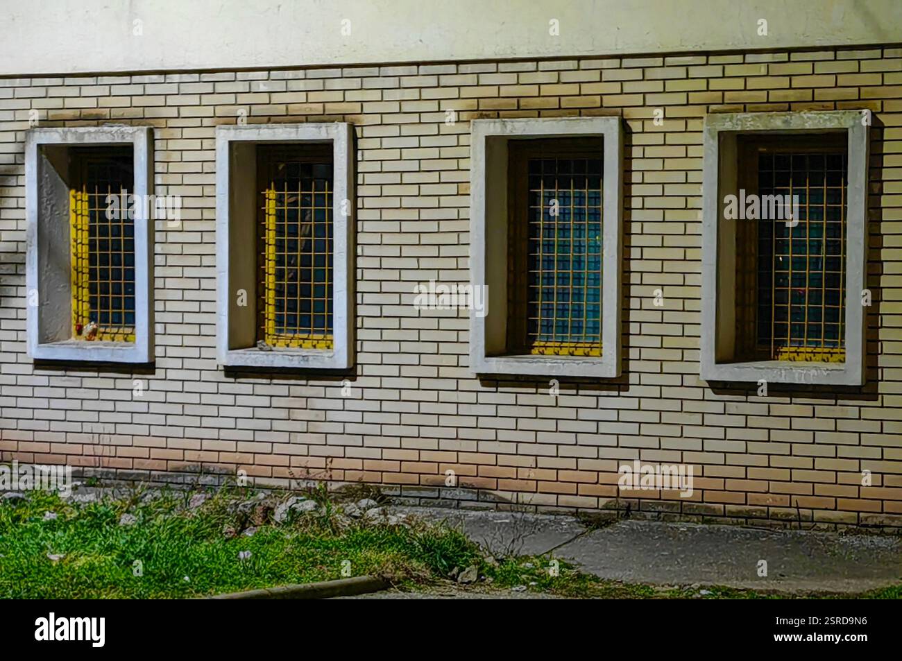 Night Frames – Old City Bus Windows in Brick Wall Layout Stock Photo ...