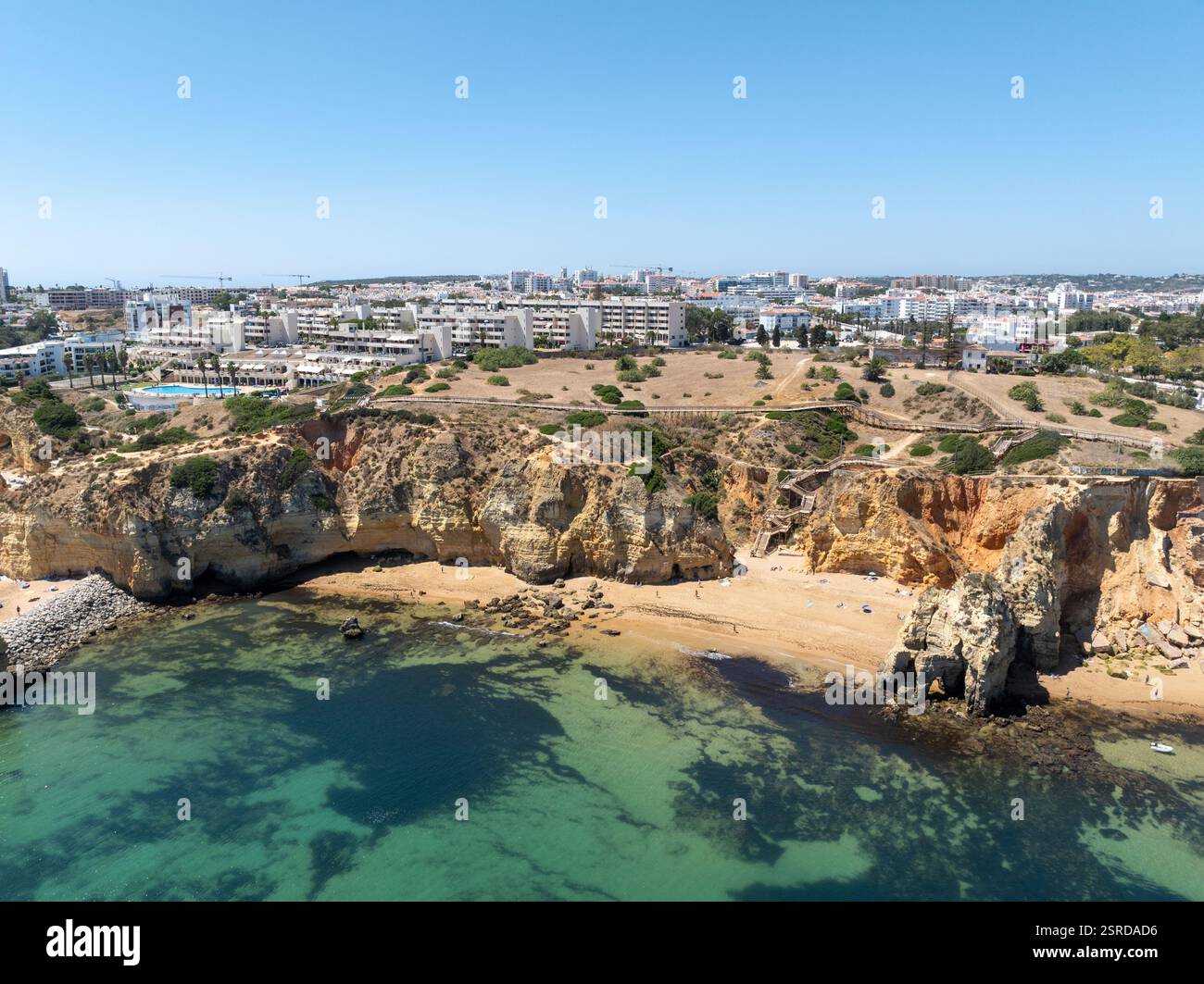 Praia de Dona Ana Beach northernmost end to the cliffed coast around ...