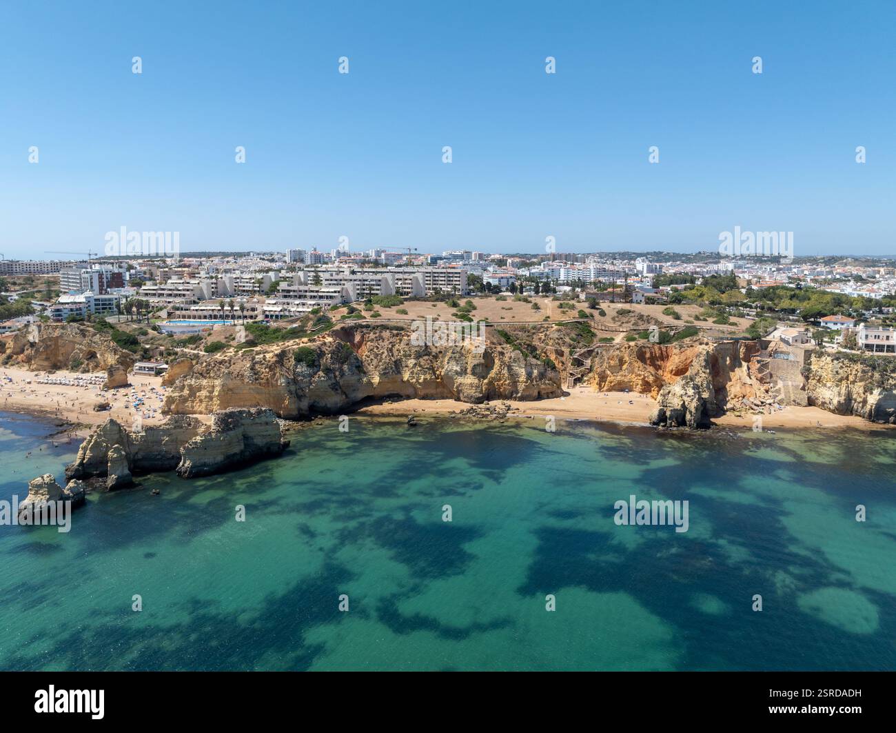 Praia de Dona Ana Beach northernmost end to the cliffed coast around ...