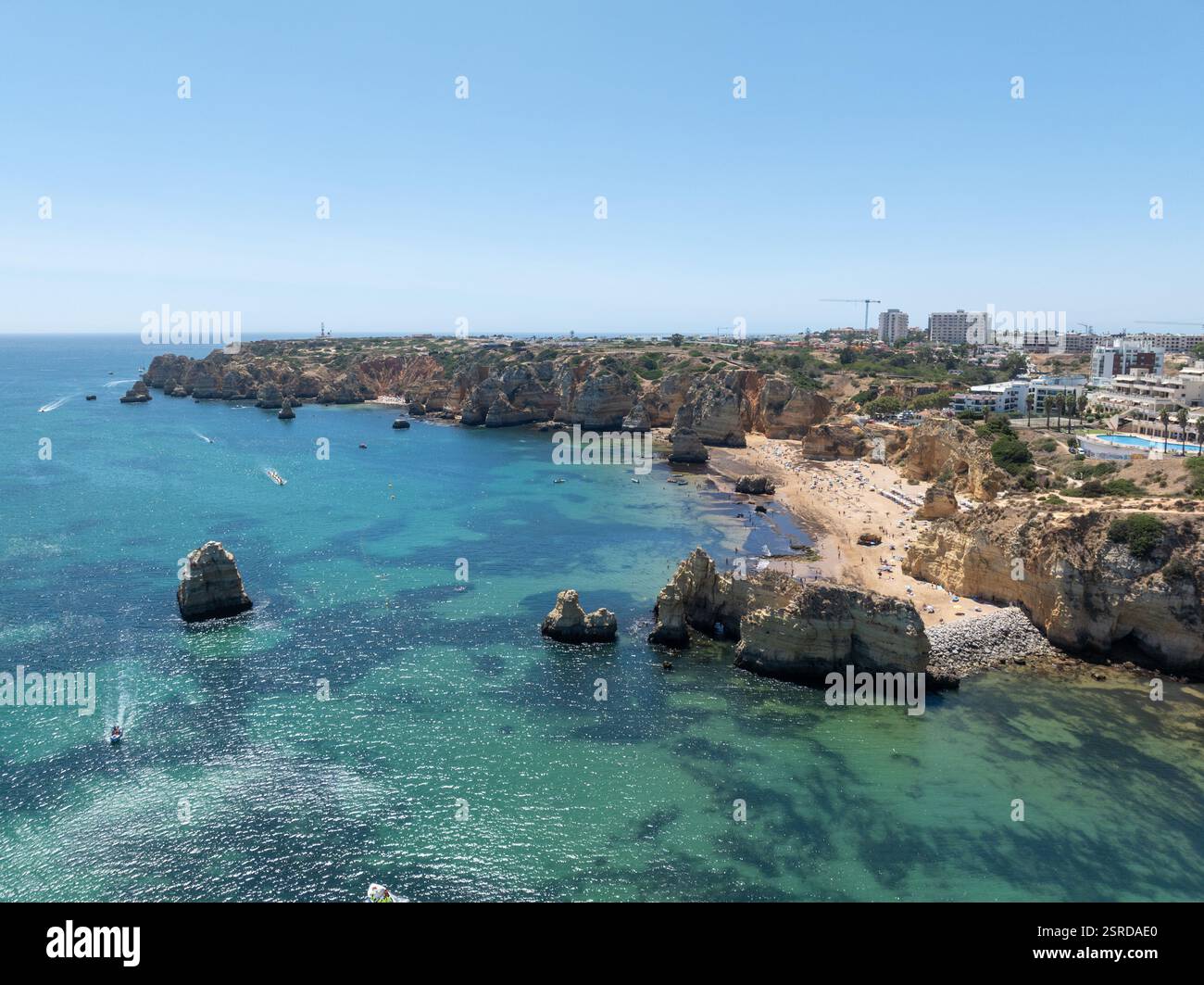 Praia de Dona Ana Beach northernmost end to the cliffed coast around ...
