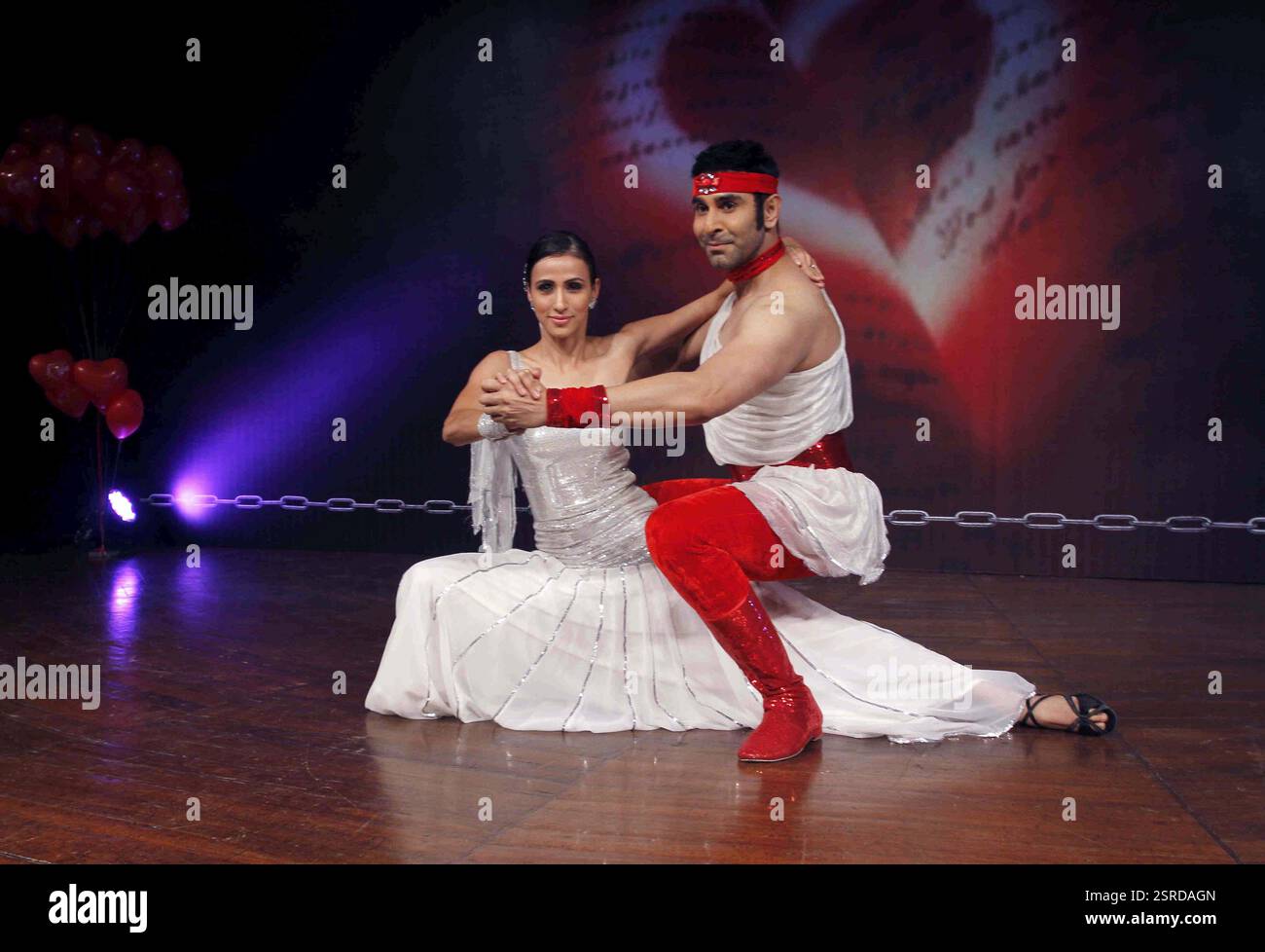 Bollywood choreographer Sandip Soparrkar and model Alesia Raut poses ...