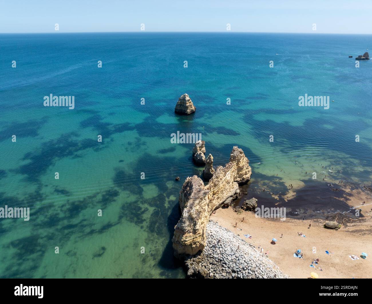 Praia de Dona Ana Beach northernmost end to the cliffed coast around ...