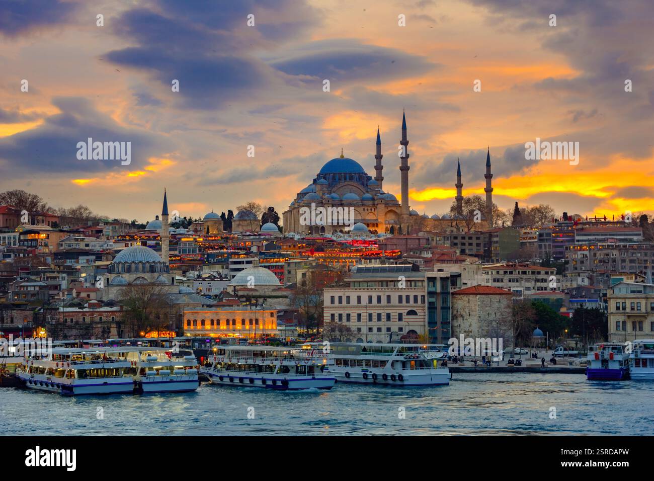 Istanbul, view from Galata bridge, with Süleymaniye Mosque and boats at ...