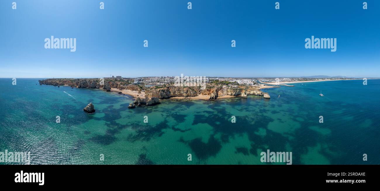 Praia de Dona Ana Beach northernmost end to the cliffed coast around ...