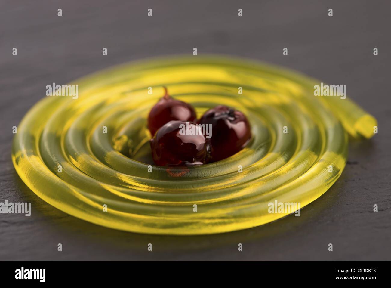 Molecular fruit spaghetti with rowan in syrup Stock Photo - Alamy
