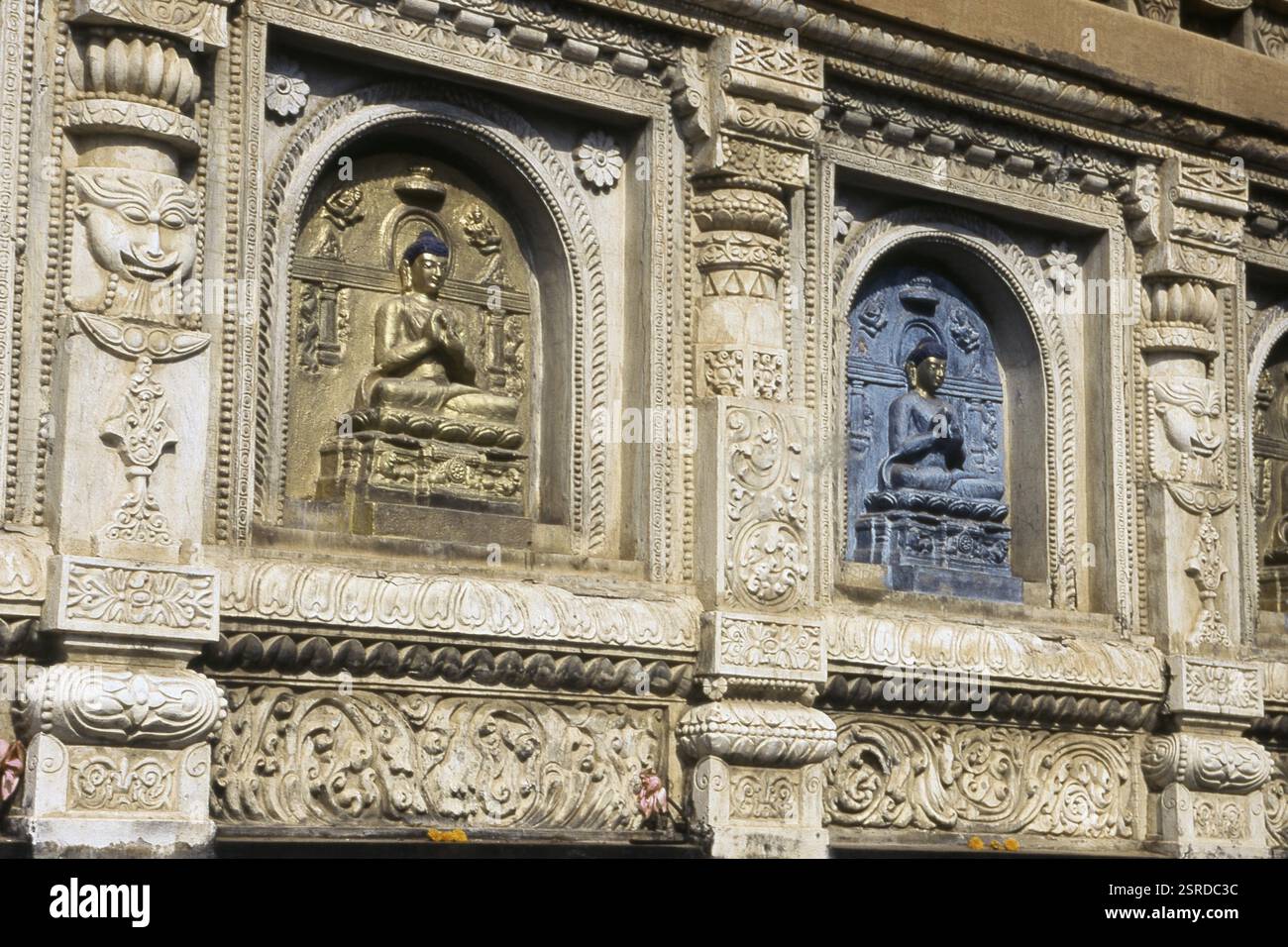 Carved Buddha on Mahabodhi Temple wall, Bodh Gaya, Bihar, India, Asia ...