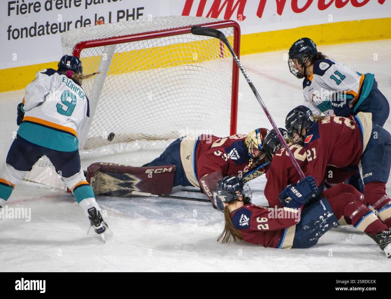 New York Sirens' Jessie Eldridge (9) scores on Montreal Victoire's Ann ...