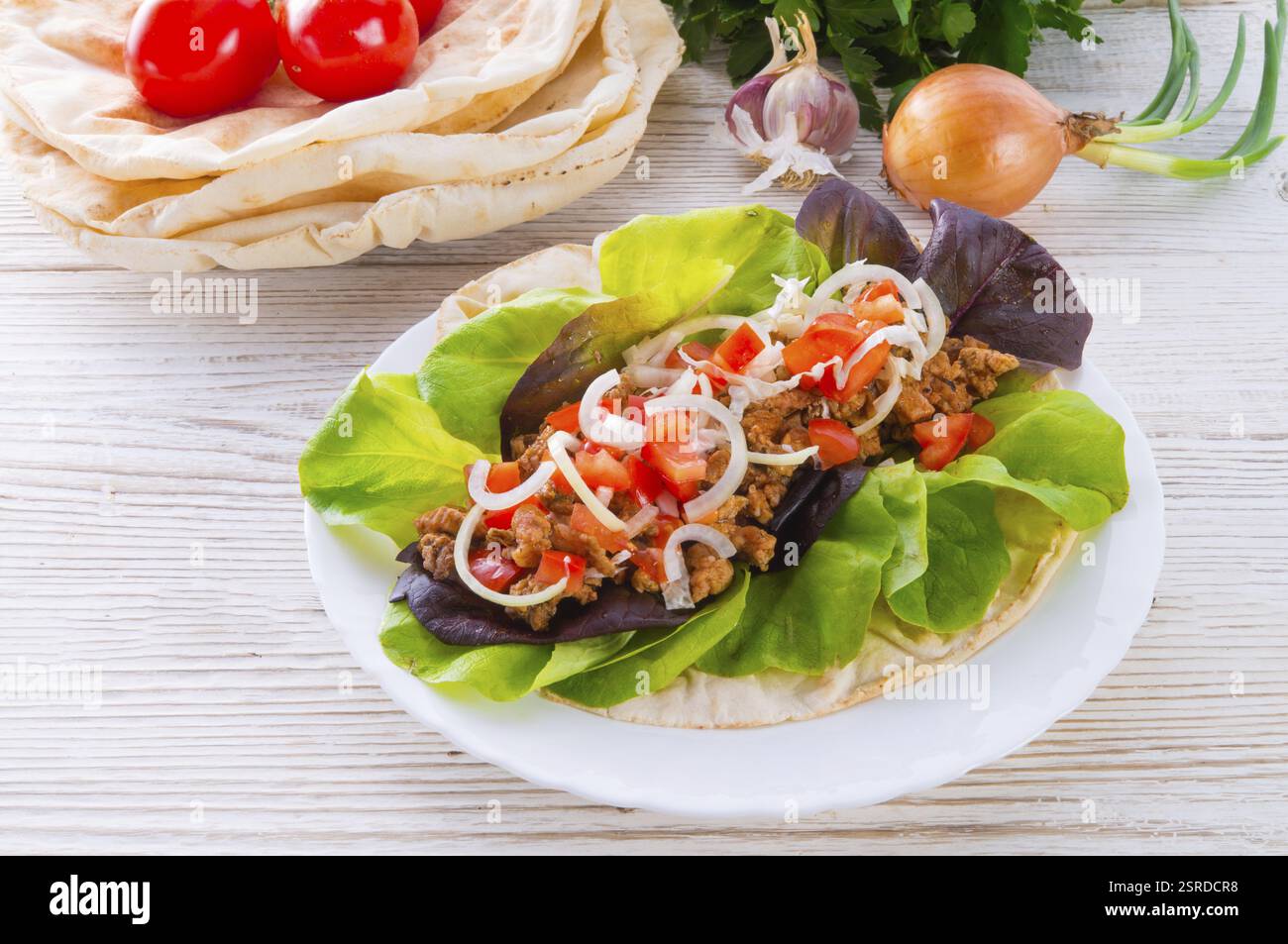 Kebab - grilled meat, bread and vegetables Stock Photo - Alamy