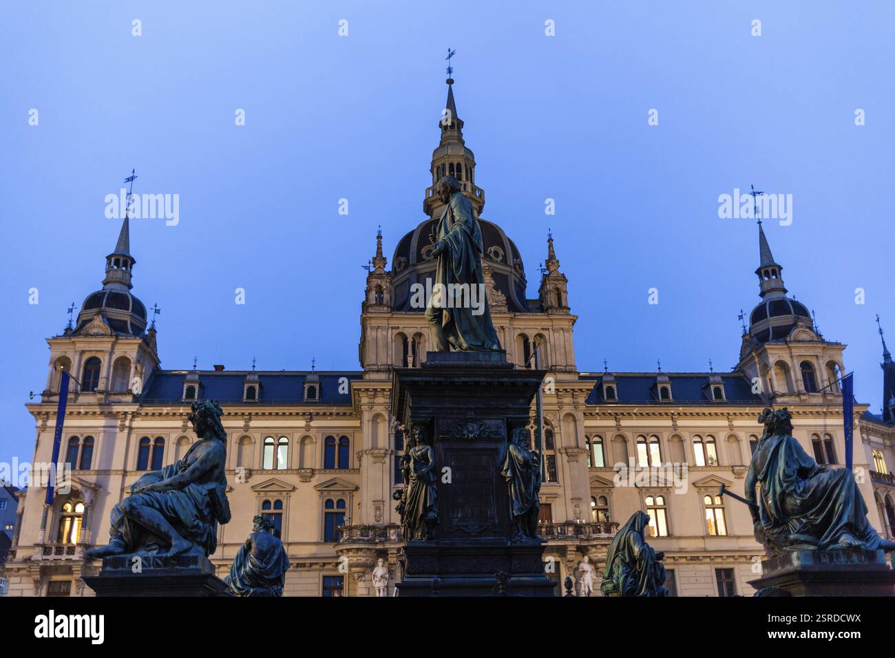 Fountain with monument to Archduke Johann on the main square, behind ...