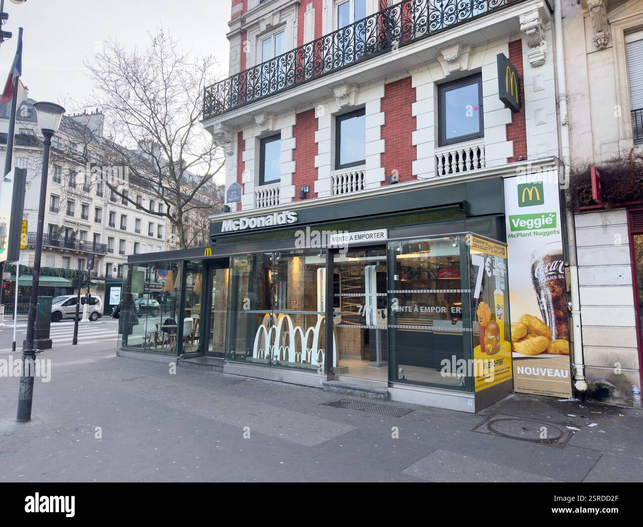 Fast food delight in a lively Parisian street corner during early ...