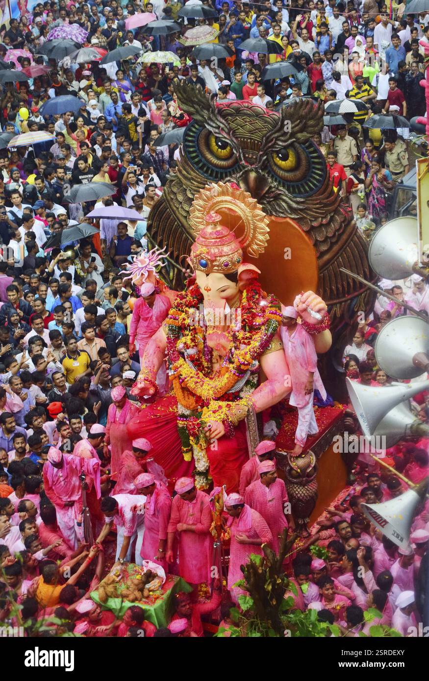 A gigantic idol of Hindu elephant-headed god Ganesh, being led to the ...