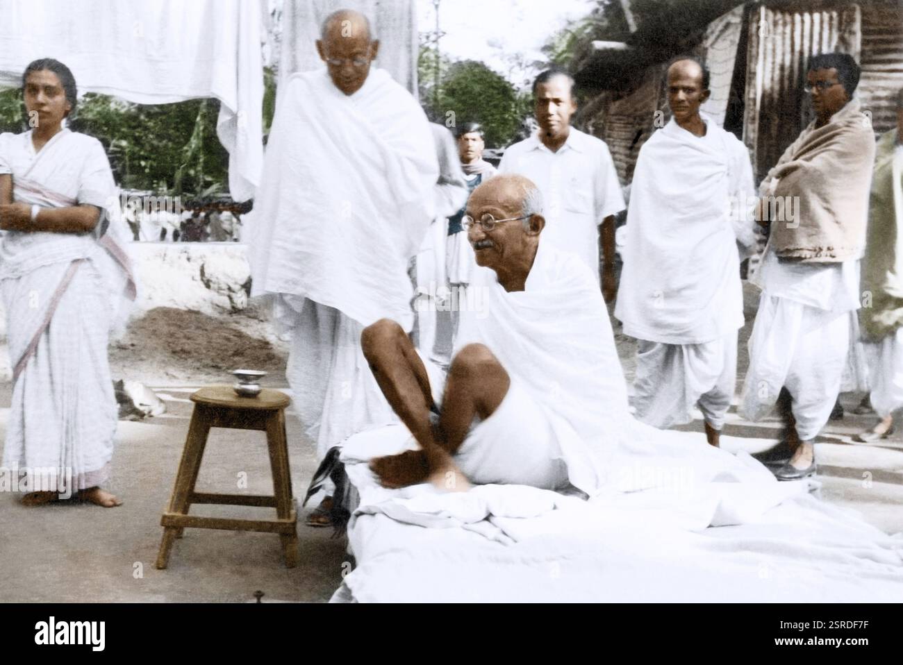 Mahatma Gandhi on bed during his peace march, East Bengal, India, Asia ...