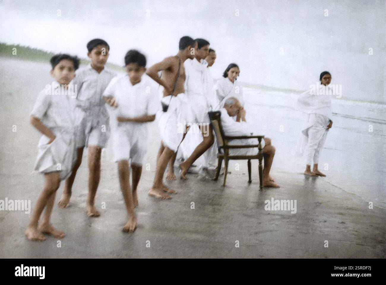 Mahatma Gandhi sitting on chair and Devdas Gandhi on Juhu Beach, Mumbai ...