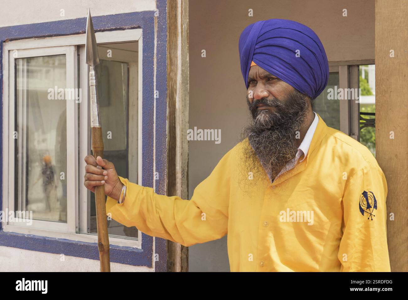 Volunteer security guard at golden temple, amritsar, punjab, India ...