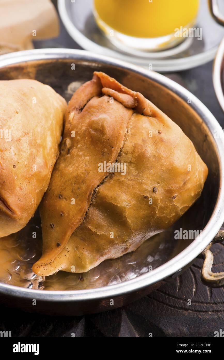 Veg Samosa - is a crispy and spicy Indian triangle shape snack Stock ...