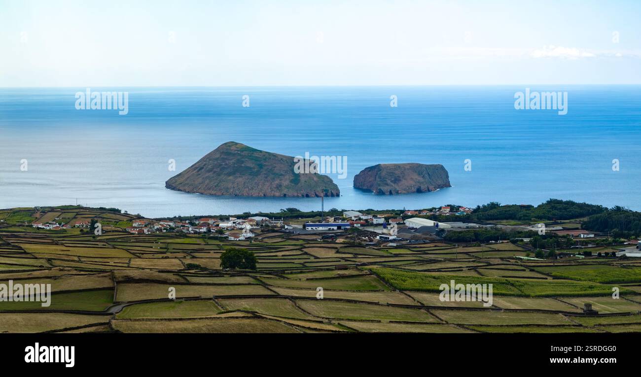 Small islets in coastline of Terceira Island in Azores called Ilheus ...