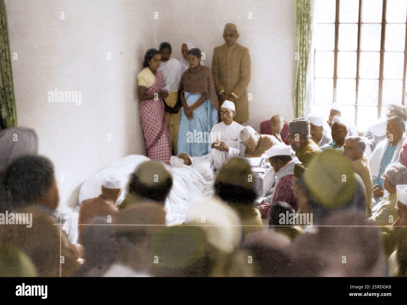 Mahatma Gandhi reading lying in bed, Birla House, Delhi, India, Asia ...