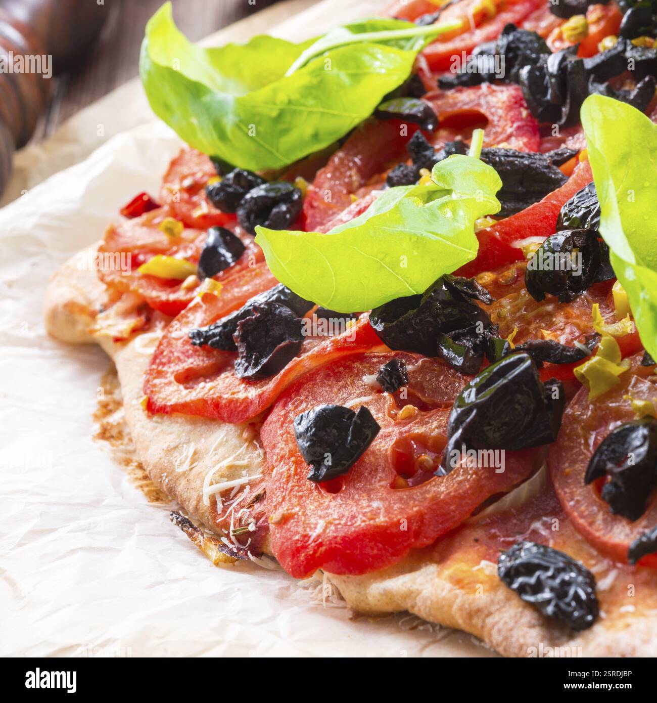 Homemade olive - tomato pizza Stock Photo - Alamy