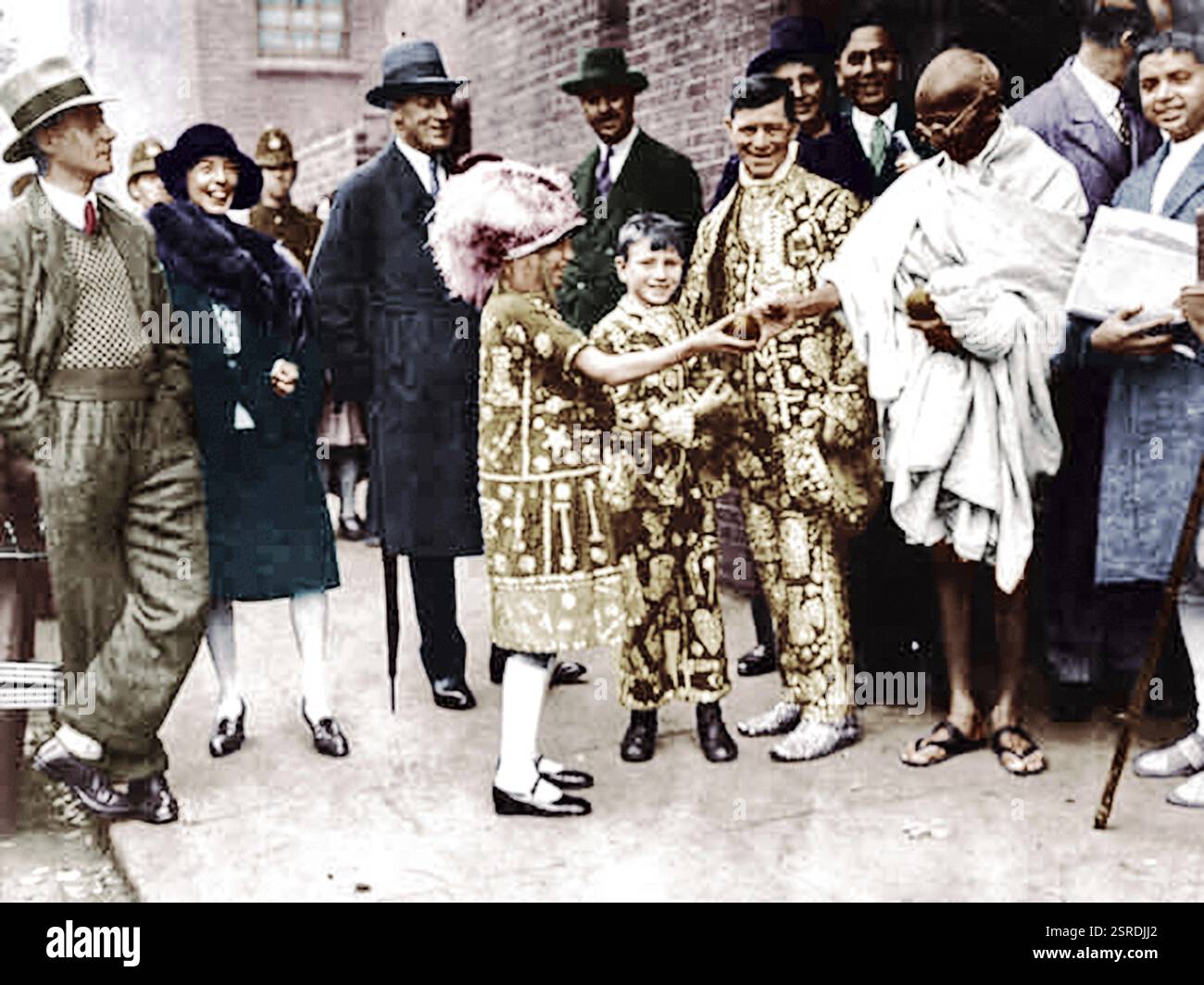 Pearly King of Houston, presenting oranges to Mahatma Gandhi, Kingsley ...