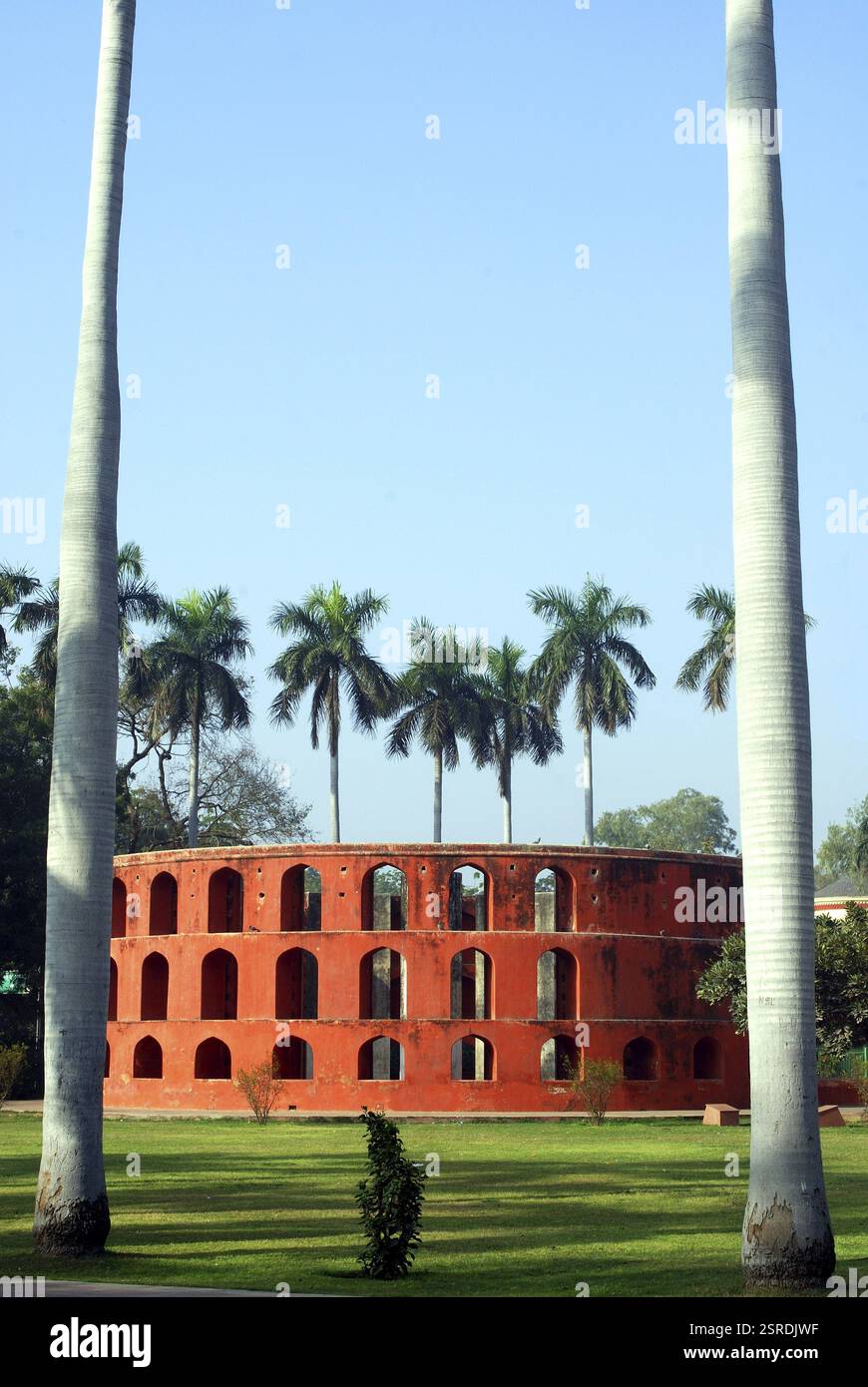 Circular red structure of Jantar Mantar lawn in foreground and date ...