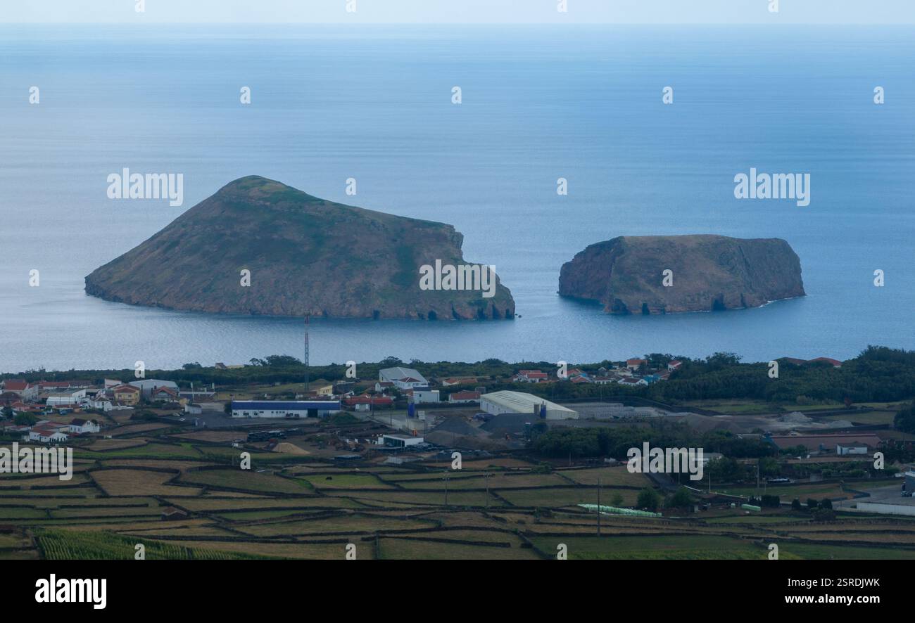 Small islets in coastline of Terceira Island in Azores called Ilheus ...