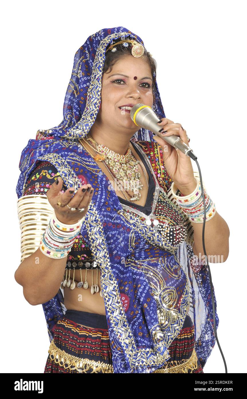 Rajasthani lady holding mike MR#786 Stock Photo - Alamy