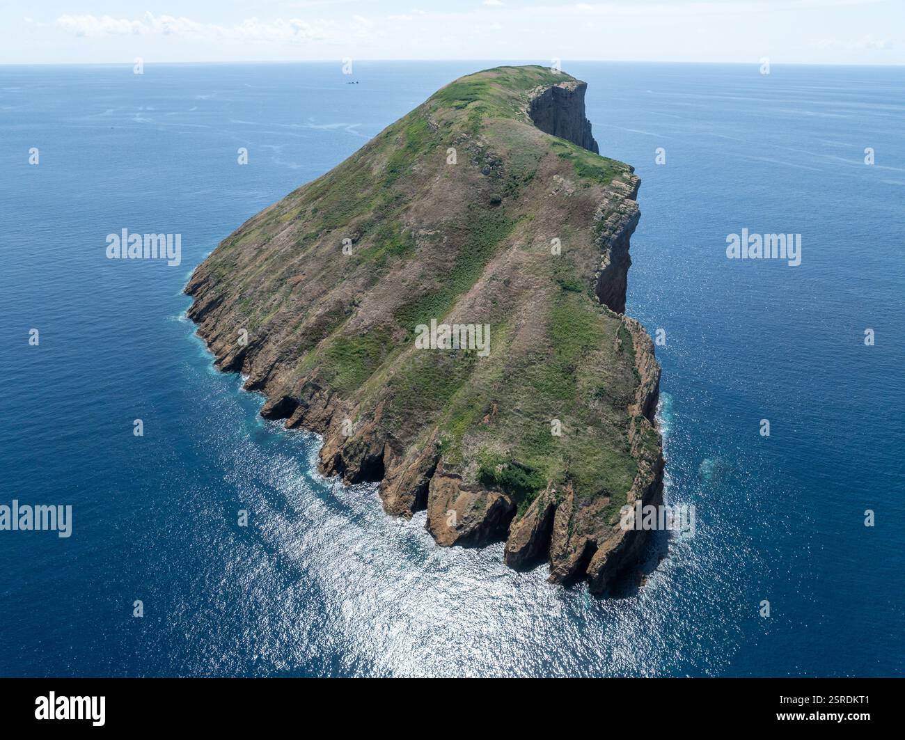 Small islets in coastline of Terceira Island in Azores called Ilheus ...