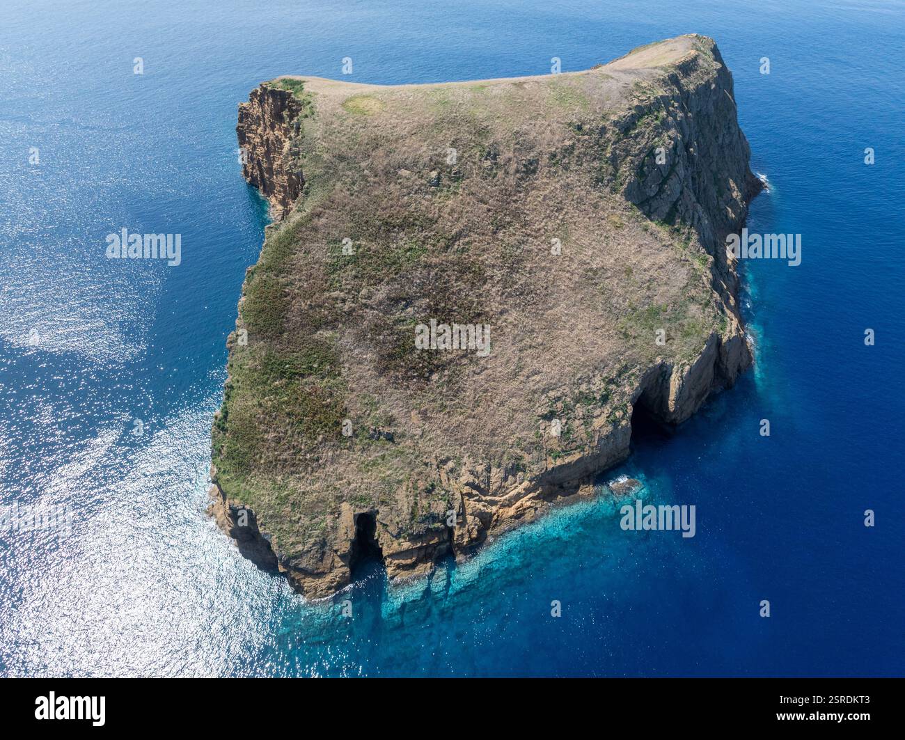 Small islets in coastline of Terceira Island in Azores called Ilheus ...