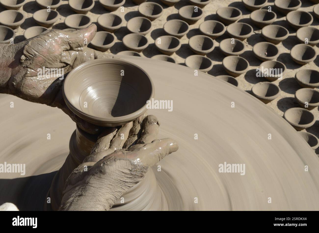 Potter making clay lamps on pottery wheel Jodhpur Rajasthan India Stock ...