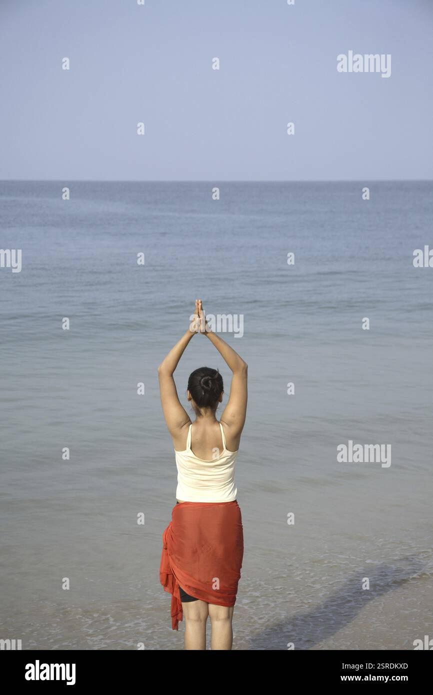 Raising palms asian woman hi-res stock photography and images - Alamy