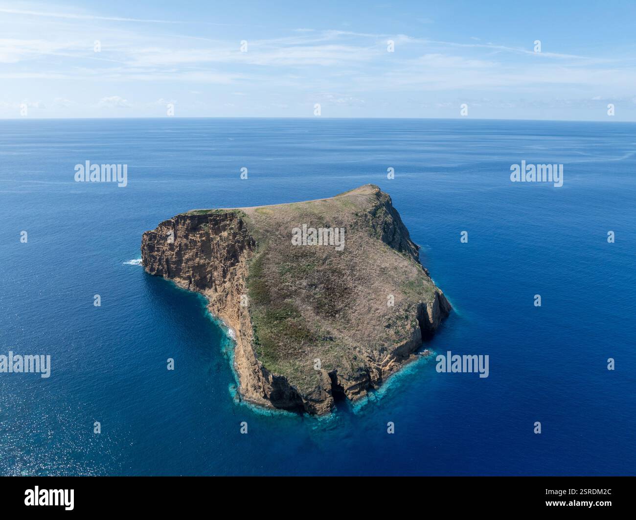 Small islets in coastline of Terceira Island in Azores called Ilheus ...