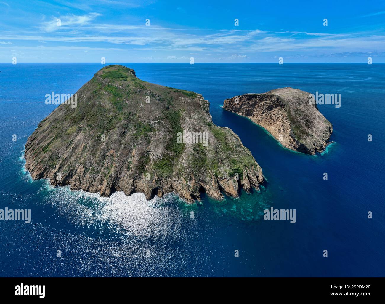 Small islets in coastline of Terceira Island in Azores called Ilheus ...