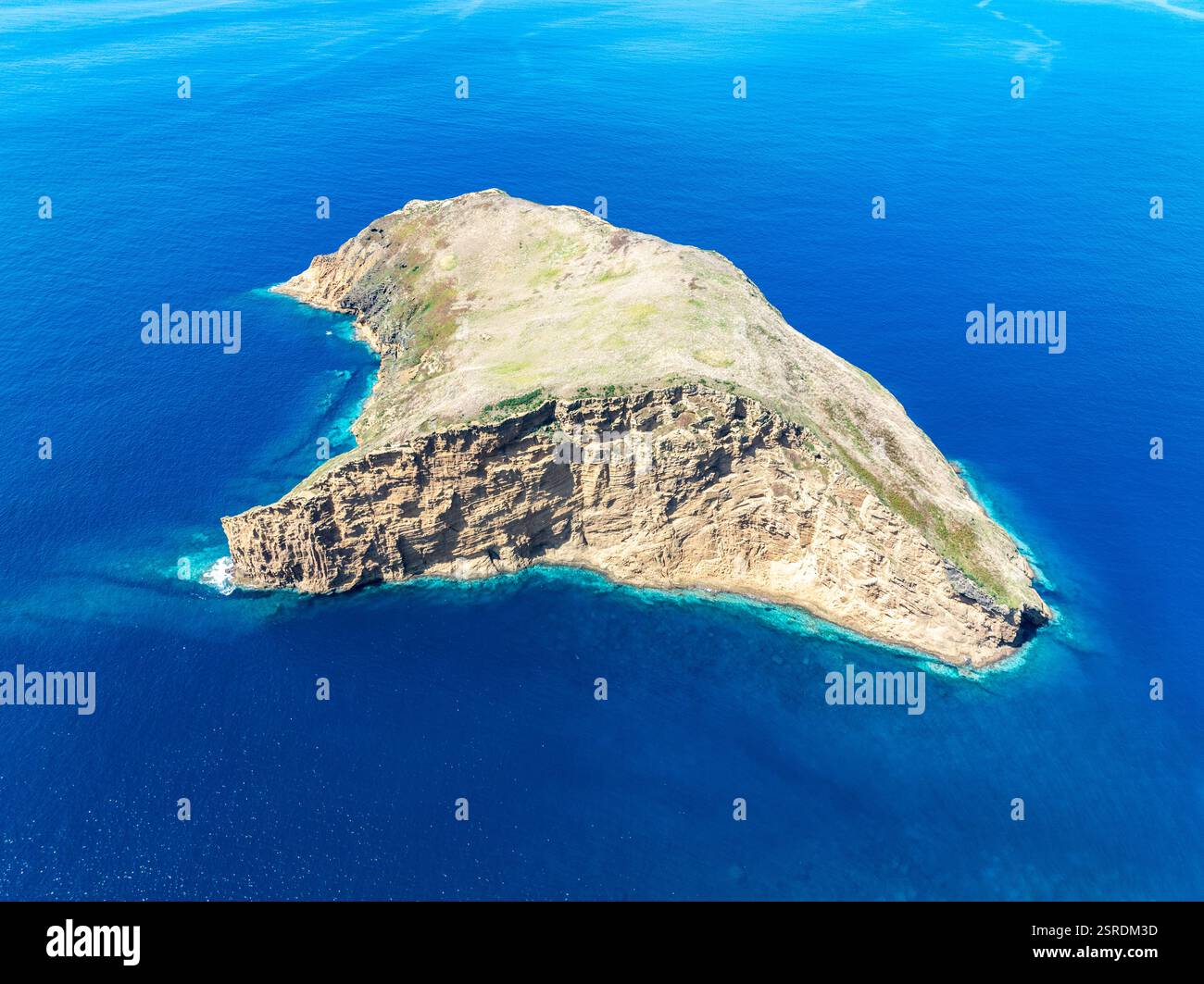 Small islets in coastline of Terceira Island in Azores called Ilheus ...