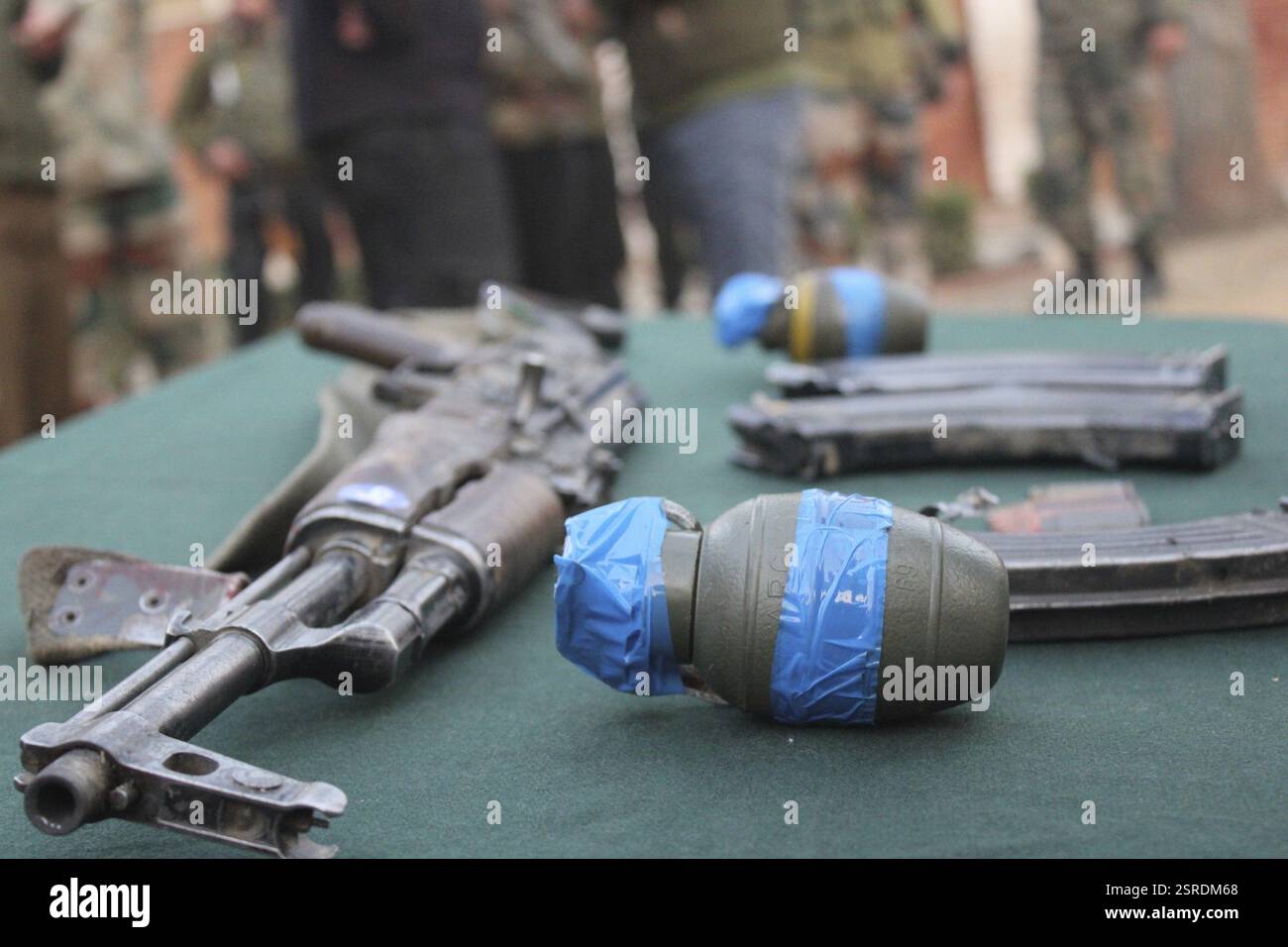 Automatic rifle and teargas shell, Sopore town, Kashmir, India, Asia ...