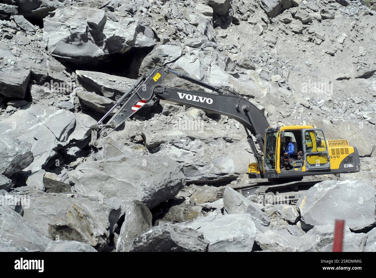 Machine clearing huge debris stones backhoe Color Colors equipment ...