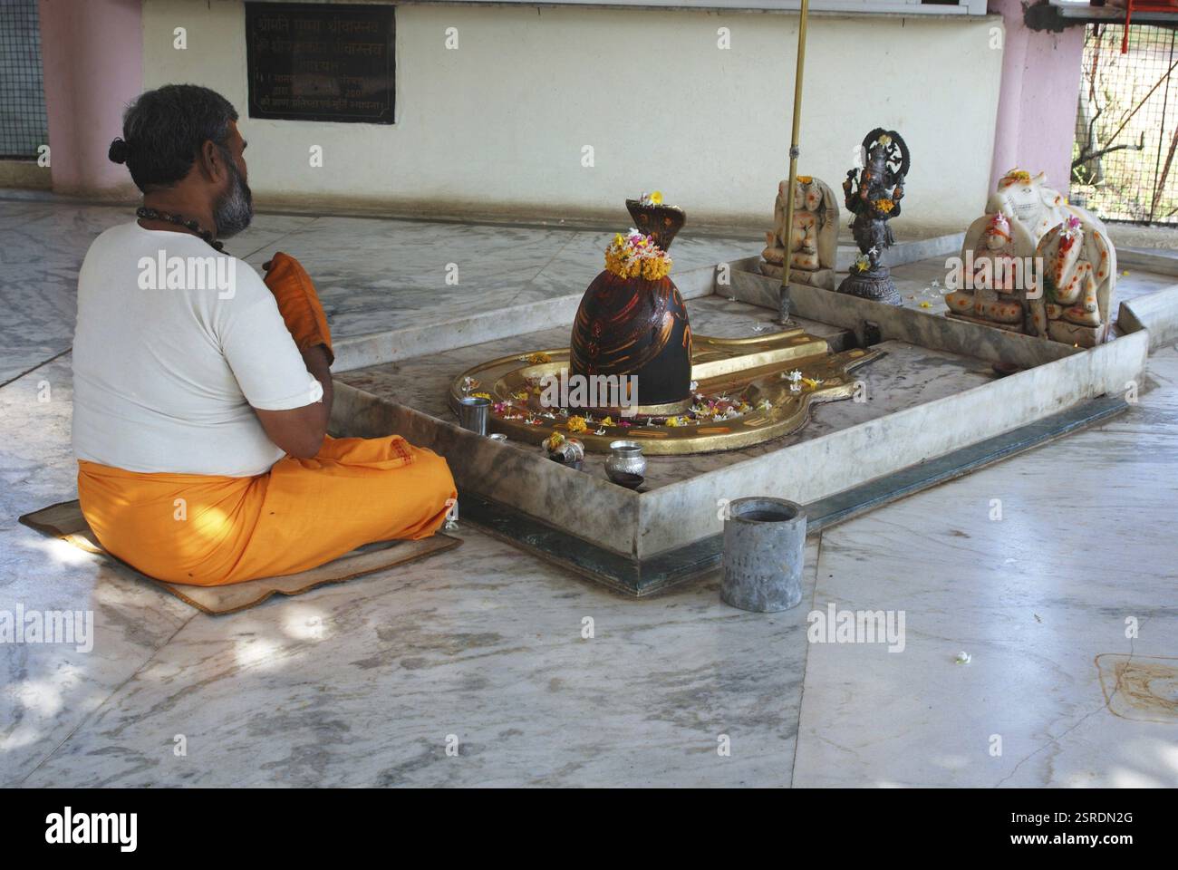 Priest doing meditation in Shiva temple, Indore, Madhya Pradesh, India ...