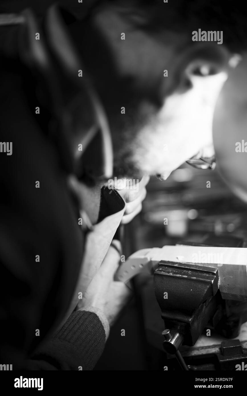 Craftsman fixing Black and White Stock Photos & Images - Alamy