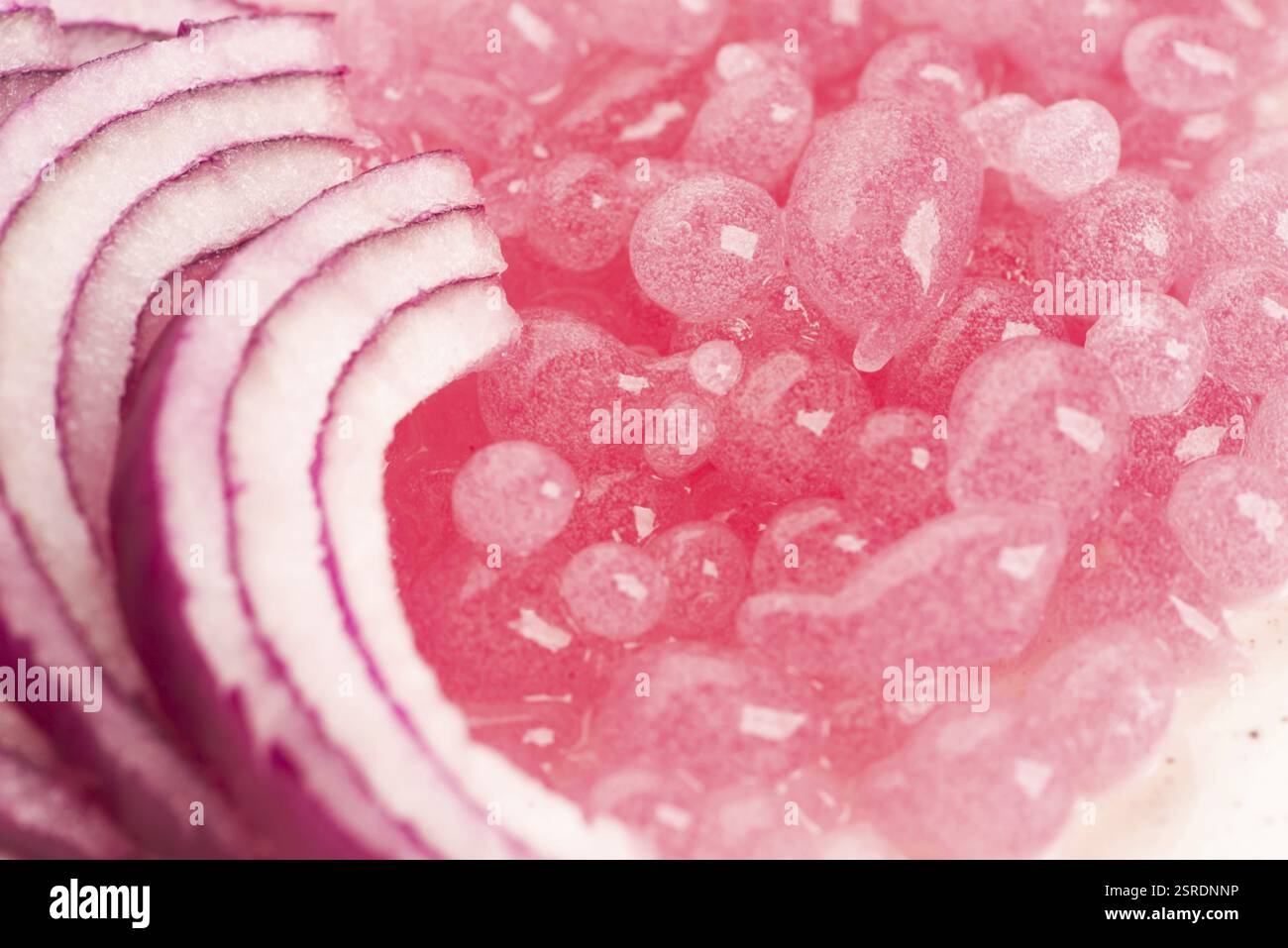 Molecular onion caviar balls on ceramics plate Stock Photo - Alamy