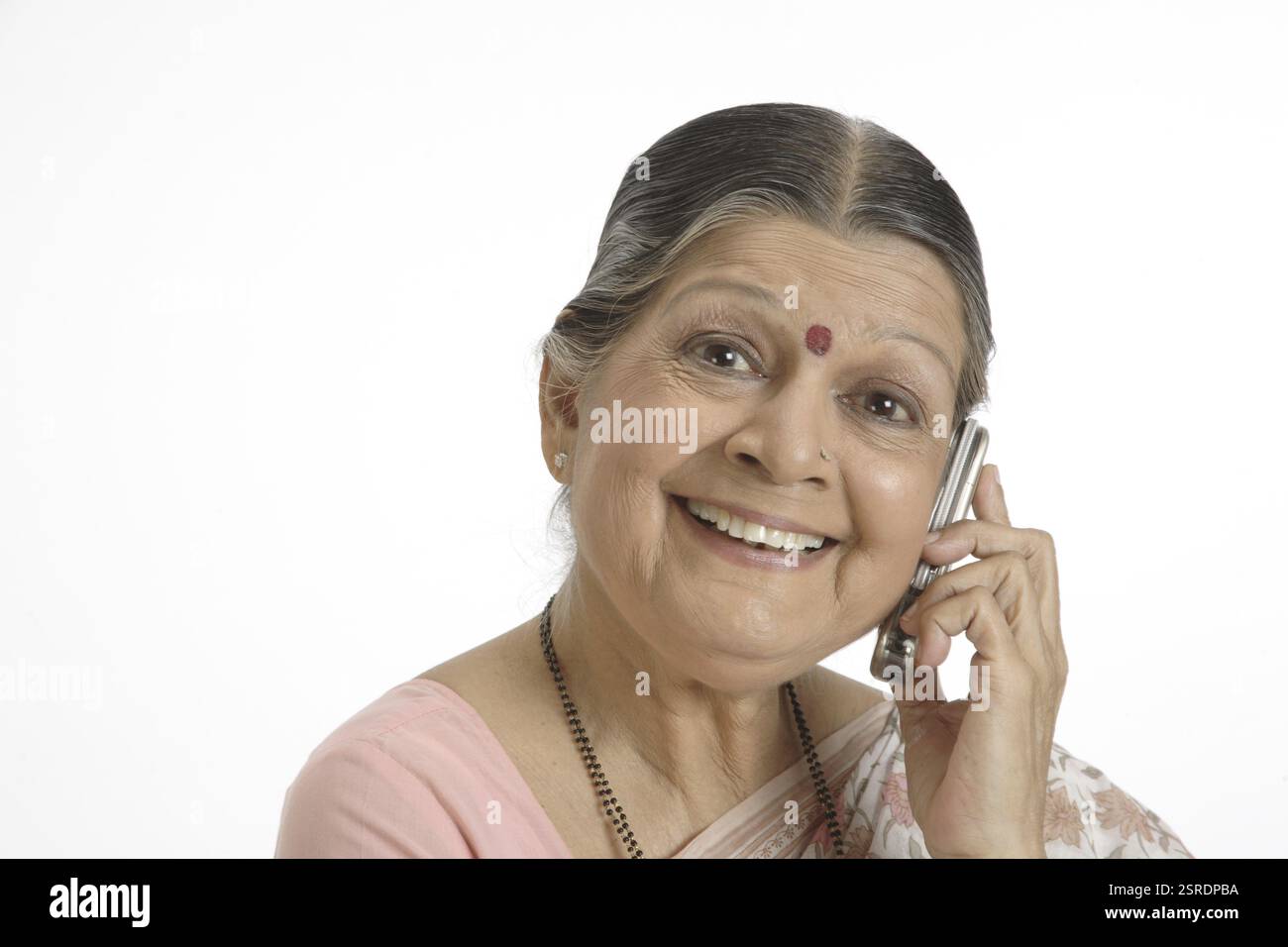Old lady talking on mobile with smiling face MR # 703A Stock Photo - Alamy