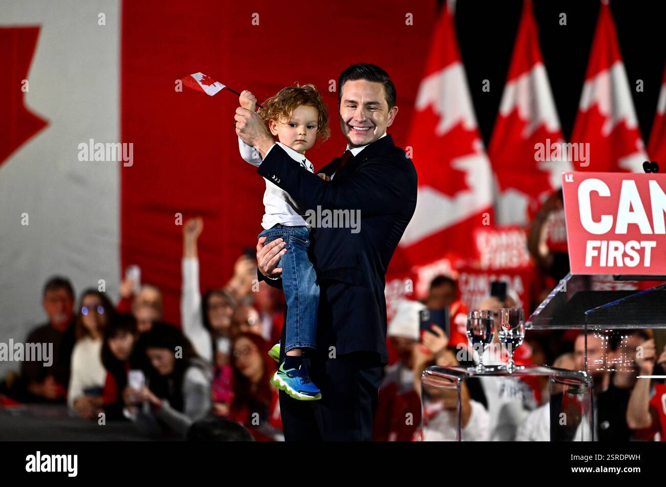 Ottawa, Can. 15th Feb, 2025. Conservative Leader Pierre Poilievre helps ...