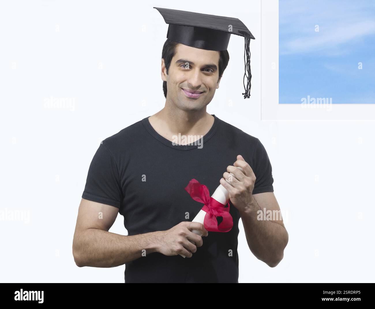 Man holding degree certificate, MR#779L Stock Photo - Alamy
