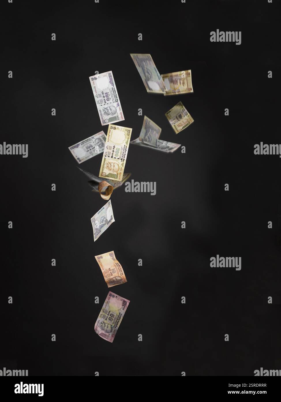 Indian currency notes floating in air Stock Photo - Alamy