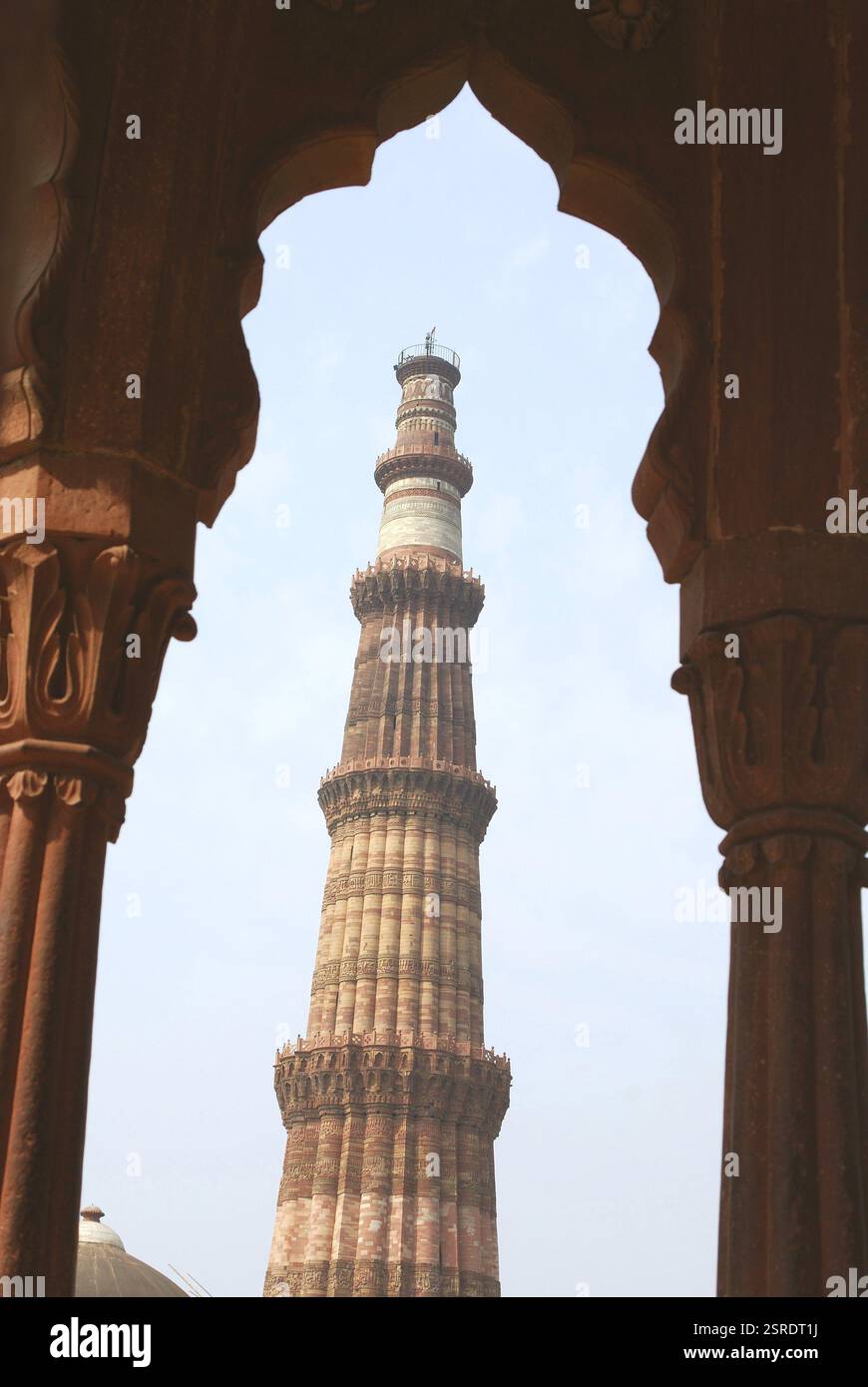 Side view of Qtab Kutub Minar through arch, Delhi, India, Asia Stock ...