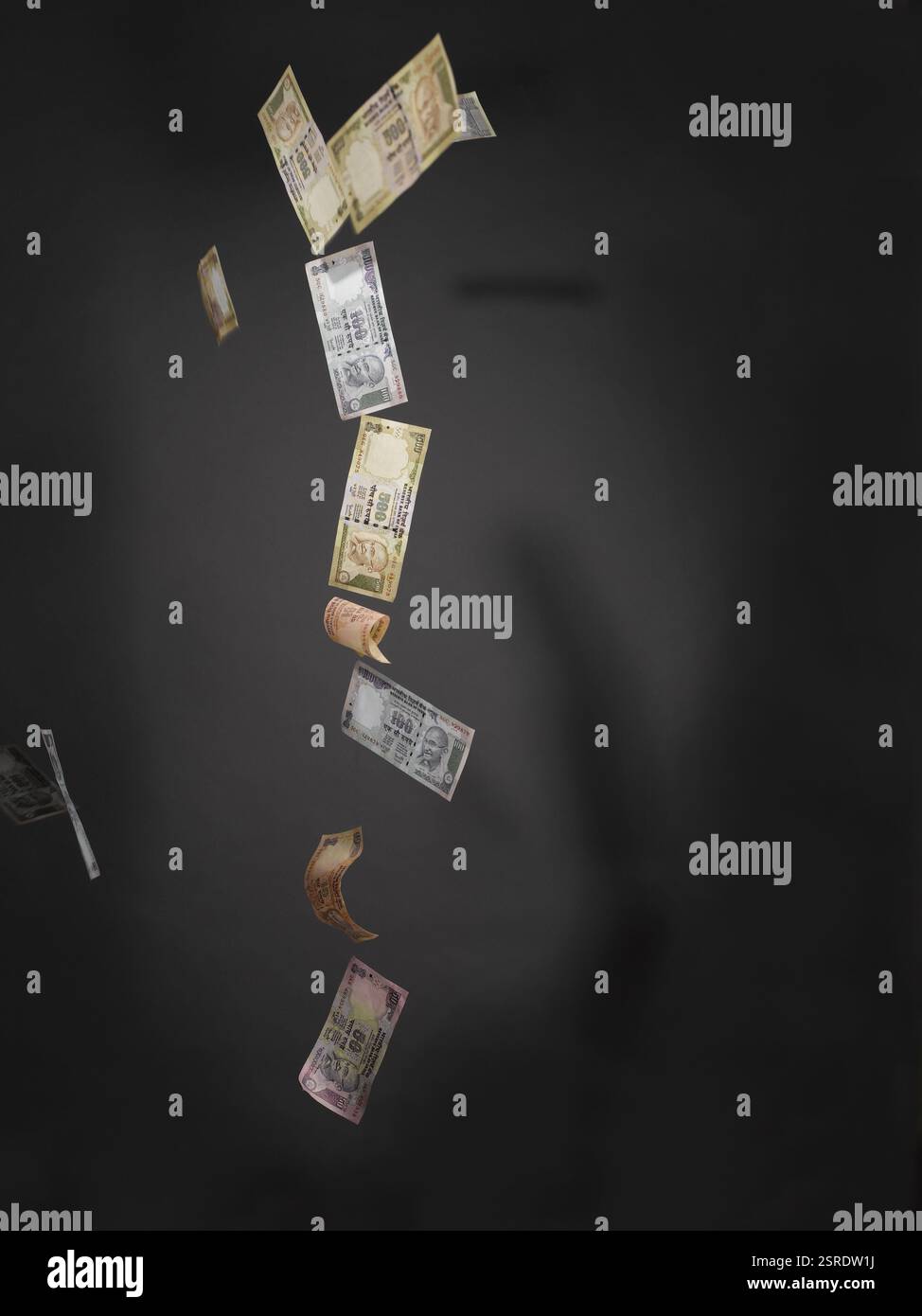 Indian currency notes floating in air Stock Photo - Alamy