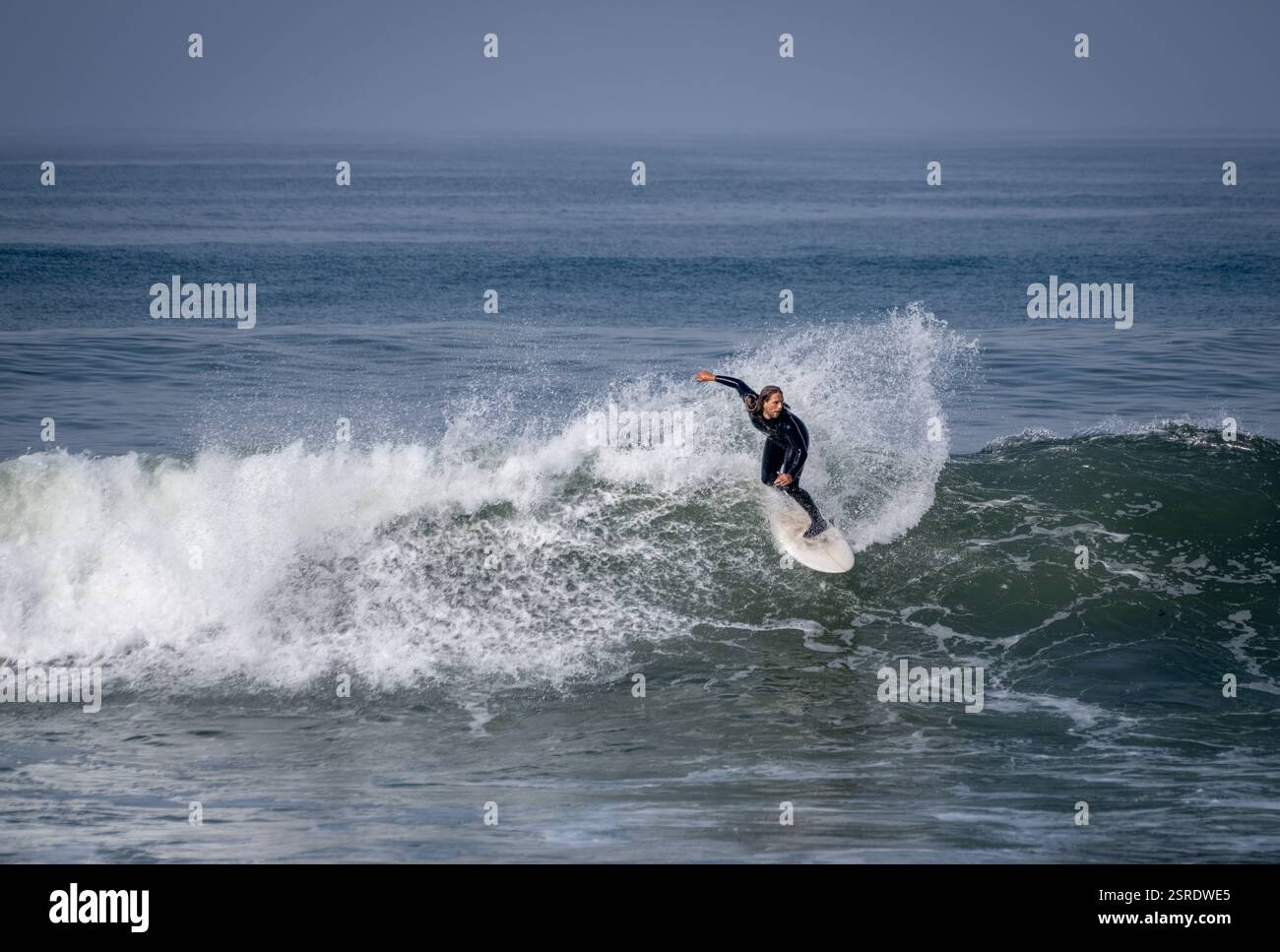 Redondo Beach, CA - USA - December 23, 2024 : Surfers take on unusually ...