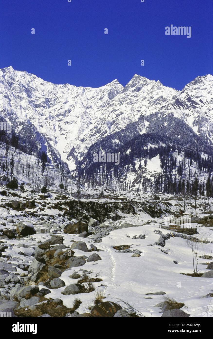 Snowcap peak and frozen Beas river, Solang valley, Manali, Himachal ...