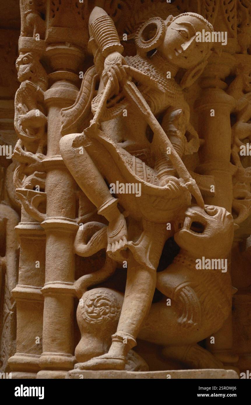 Woman with bow and arrow sculpture on Jain temple, jaisalmer, Rajasthan ...
