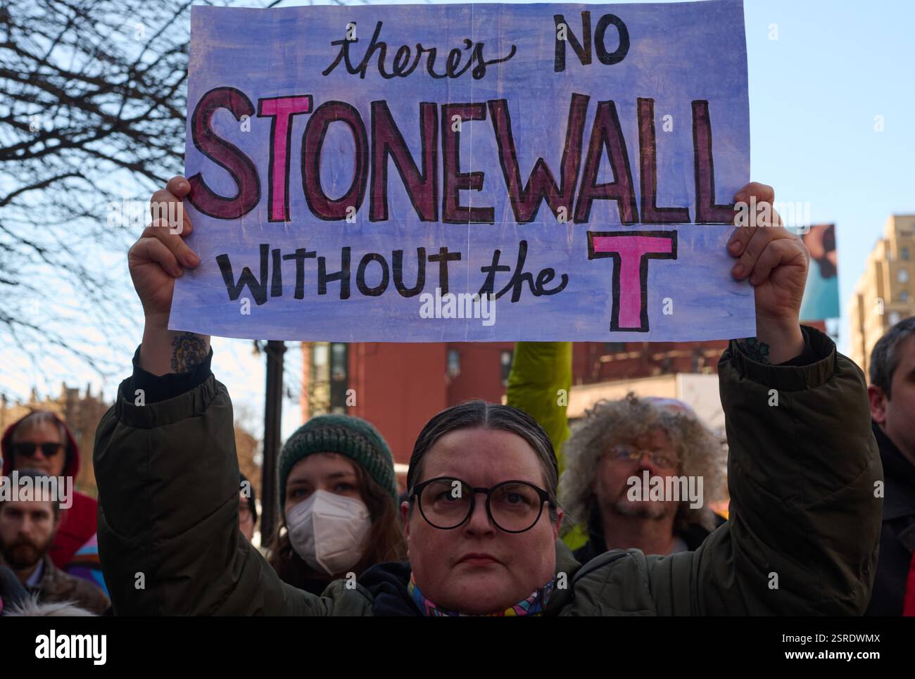 New York, New York, USA. 14th Feb, 2025. Protester holds up sign that ...