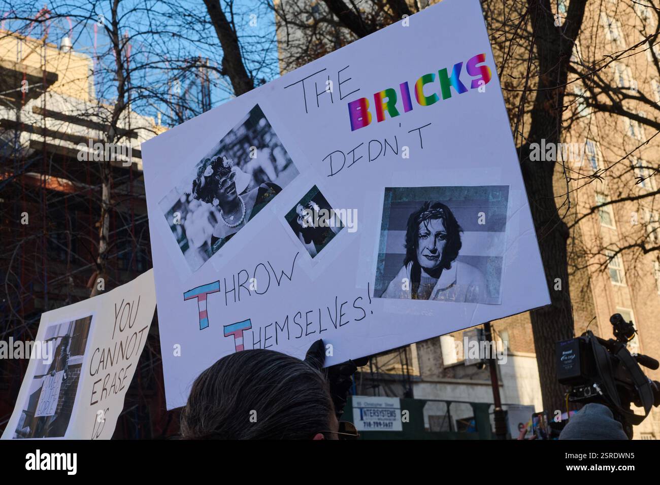 New York, New York, USA. 14th Feb, 2025. Protester holds up sign that ...